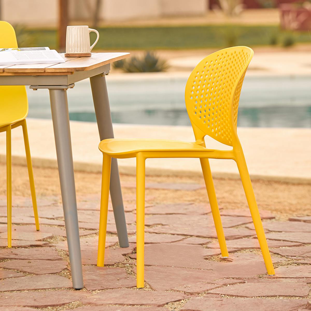 Dot Sun Yellow Stackable Outdoor Dining Chair | Article